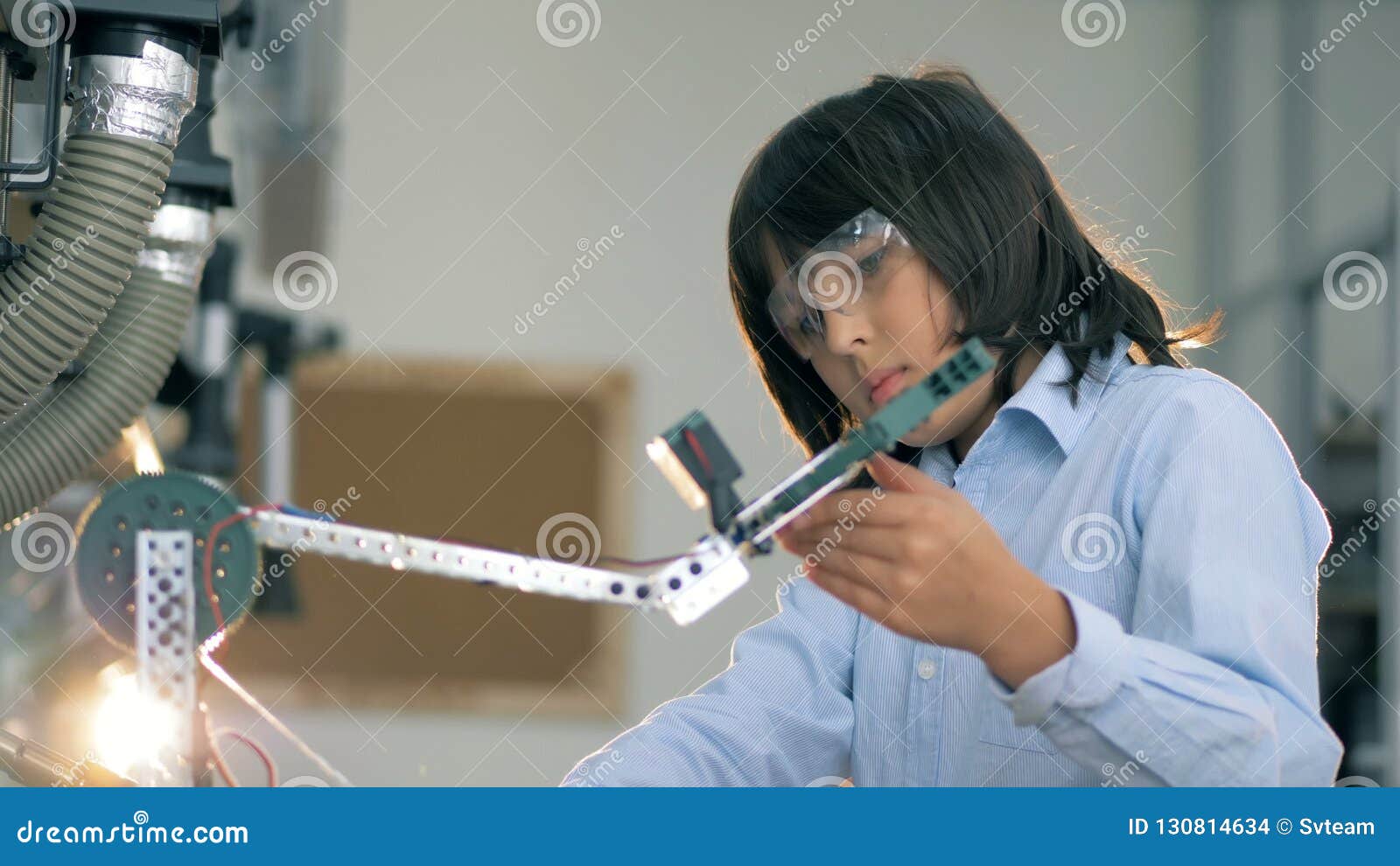 School Boy is Fixing a Robot. 4K. Stock Footage - Video of computer ...