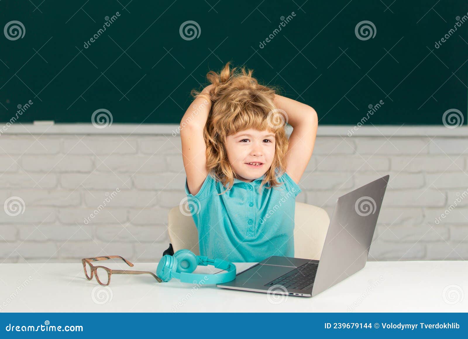 School Boy Learn Lesson Sitting at Desk, Studying Online E-learning Use ...