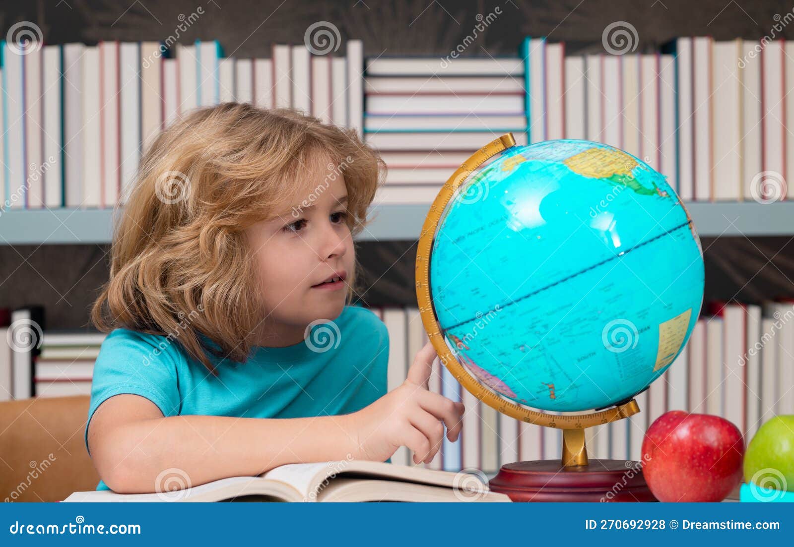 School Boy Looking at Globe in Library, Geography Lesson. School Child ...