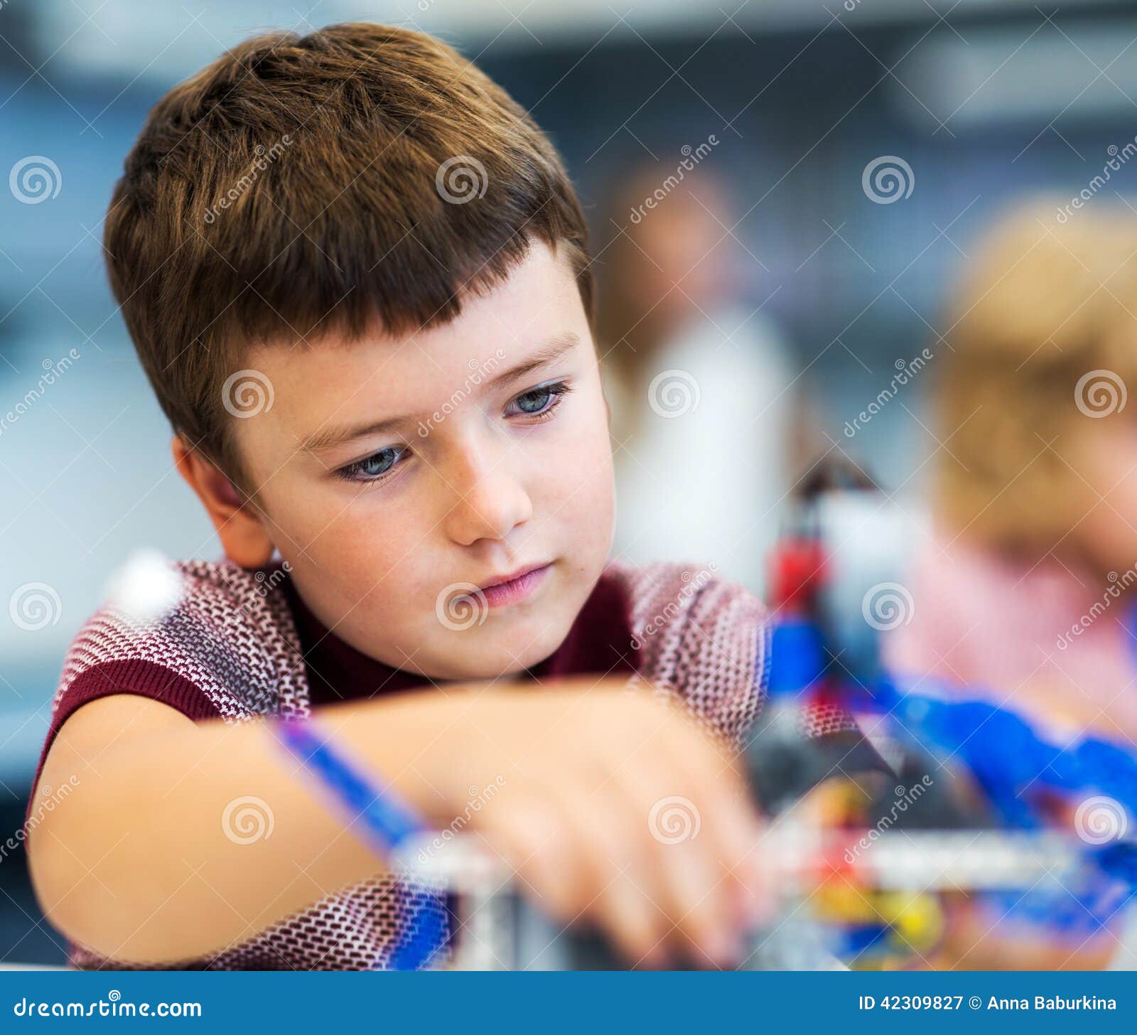 School Boy Playing with Construction Set. Stock Image - Image of boys ...