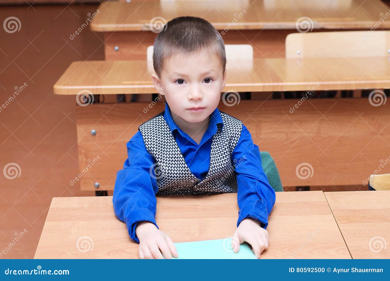 School Boy Sitting in Classroom Stock Photo - Image of note, form: 80592500