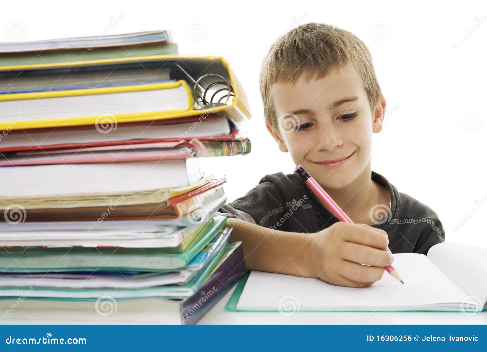 School Boy Sitting and Writing in Notebook. Stock Photo - Image of ...