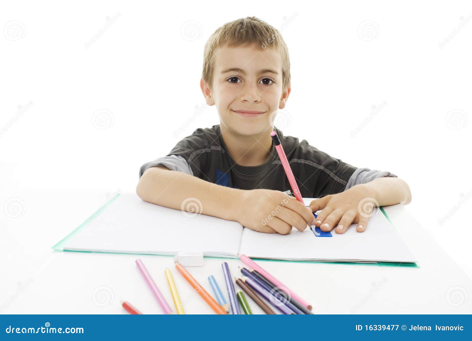 School Boy Sitting and Writing in Notebook. Stock Image - Image of ...