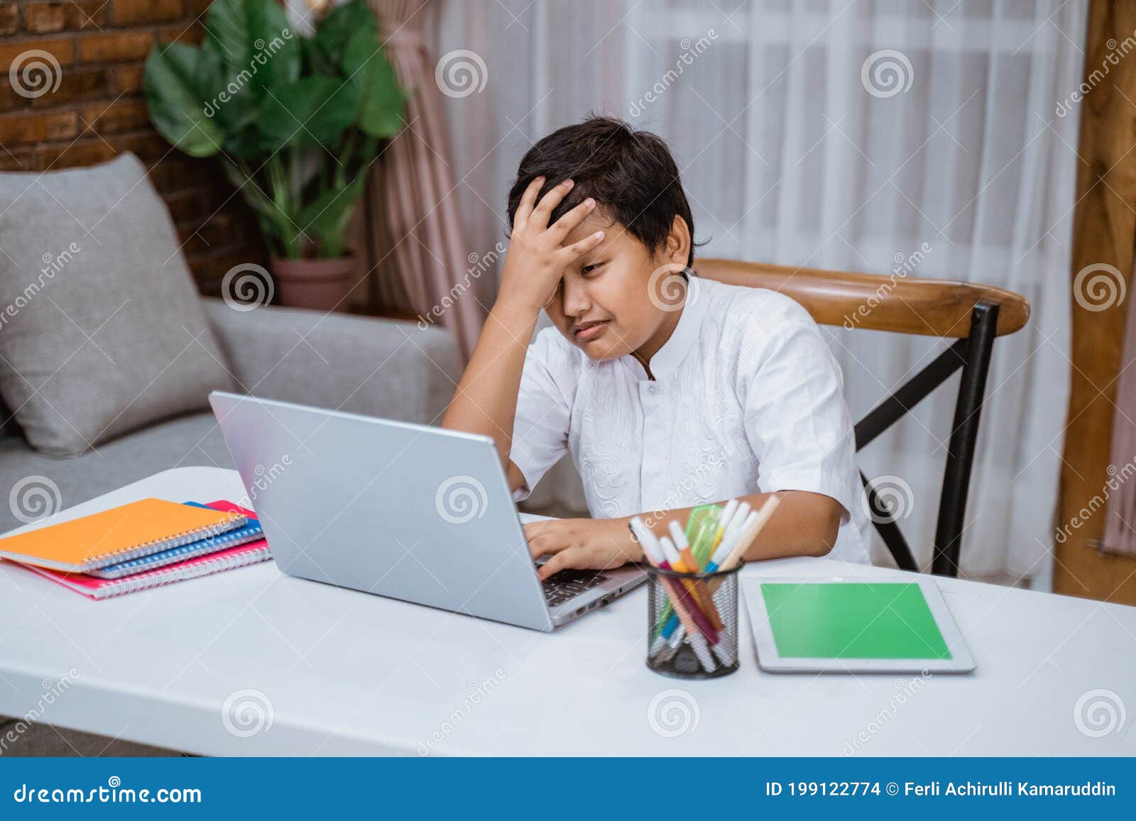 Stressed Kid with Headache for Test or Exams at Computer Stock Photo ...