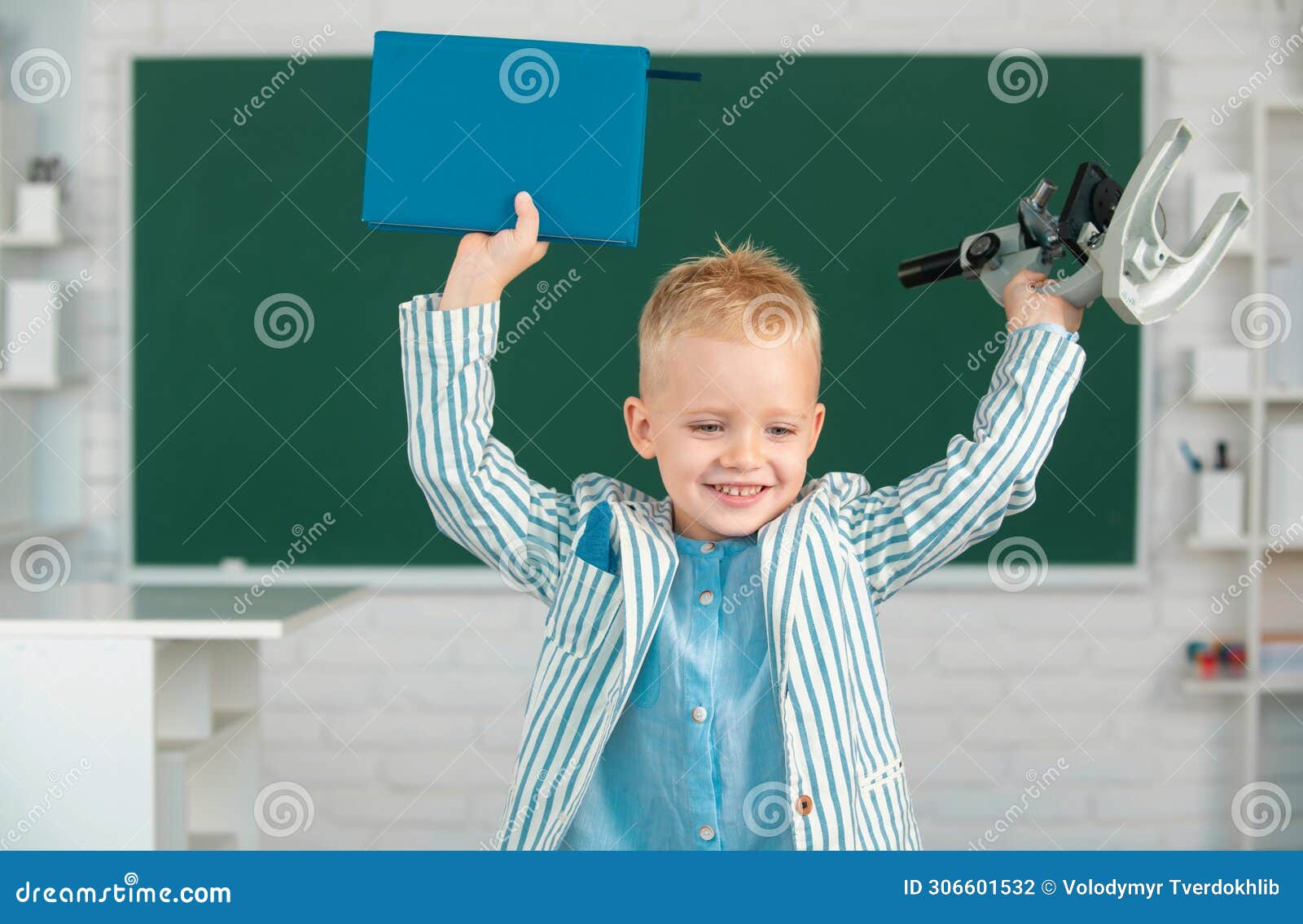 School Boy Studying Math on Lesson in Classroom at Elementary School ...