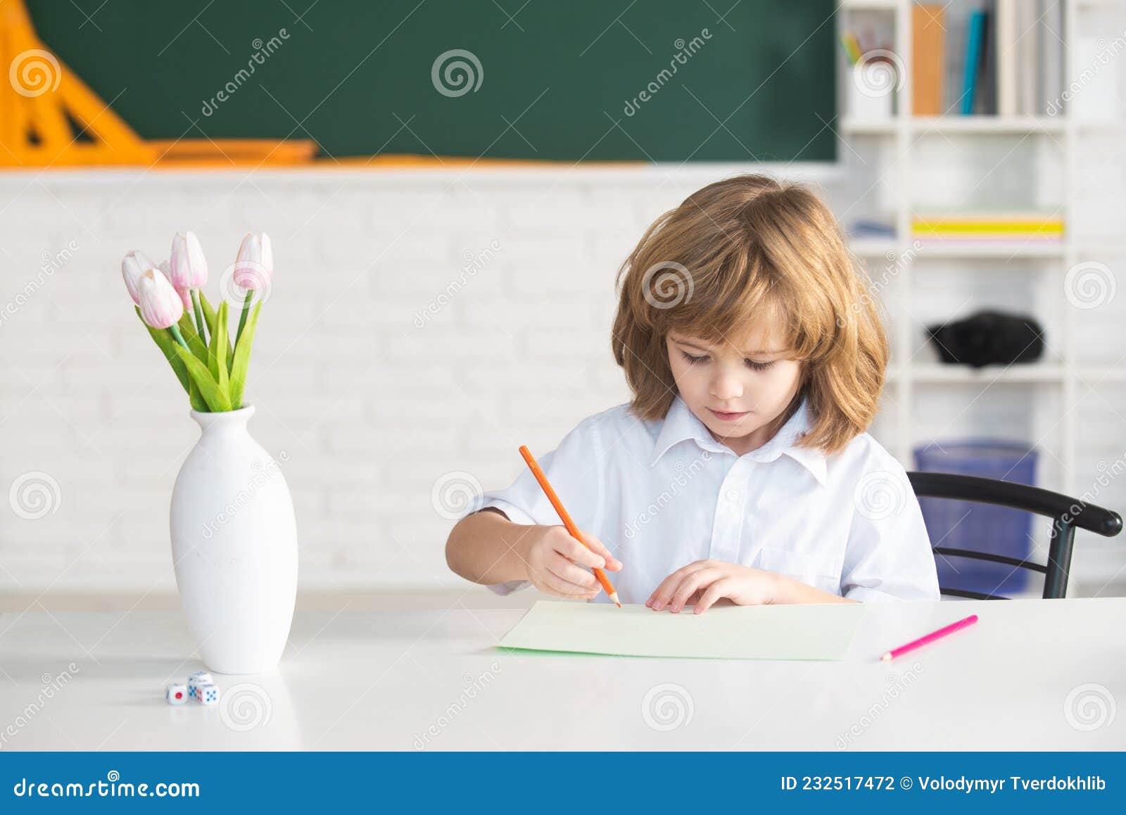 School Boy with Writing Lesson. Kids in Classroom at School. Stock ...