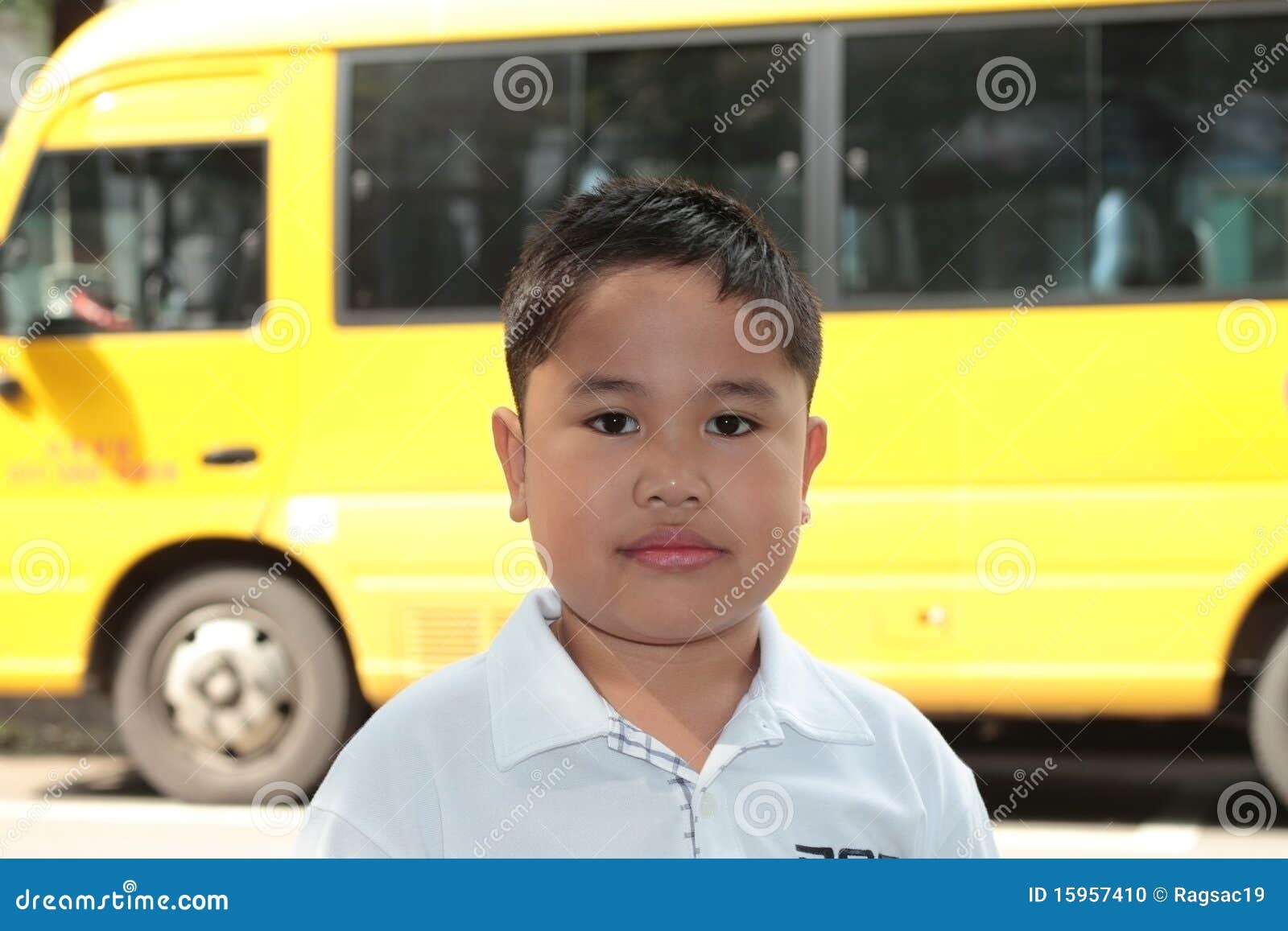 School Boy with a Yellow School Bus Stock Photo - Image of pupil ...
