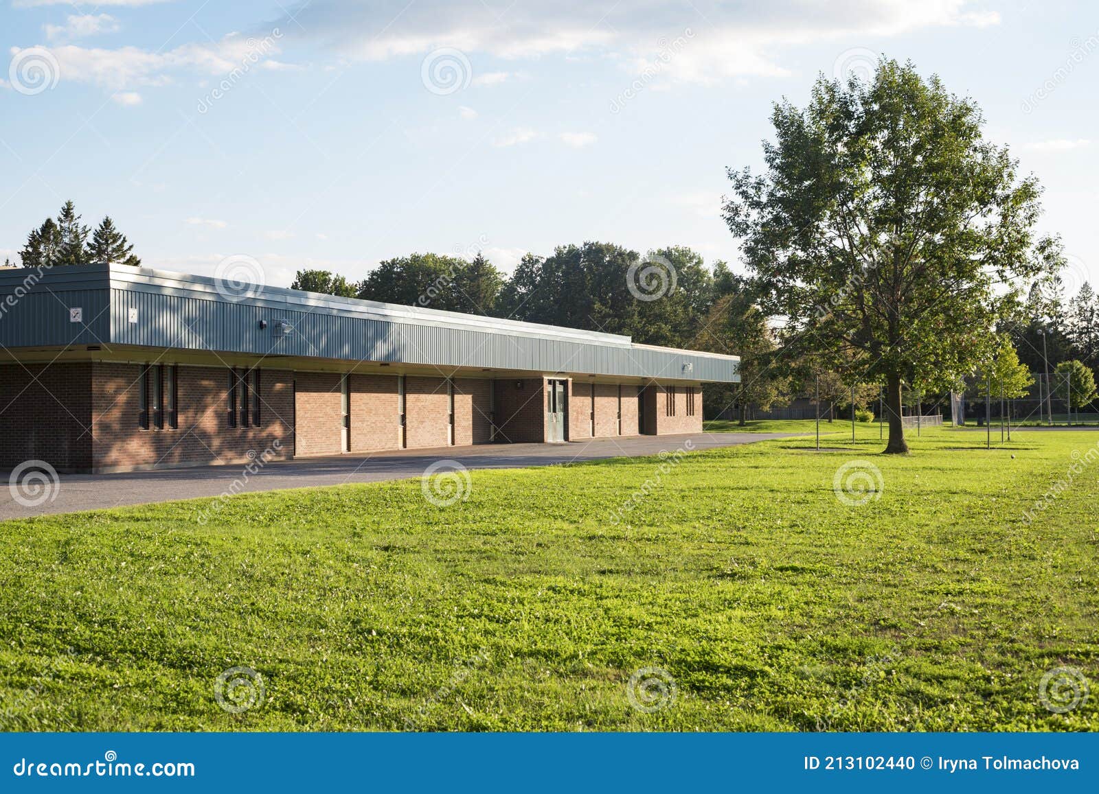 School Building and School Yard with Field Stock Photo - Image of ...