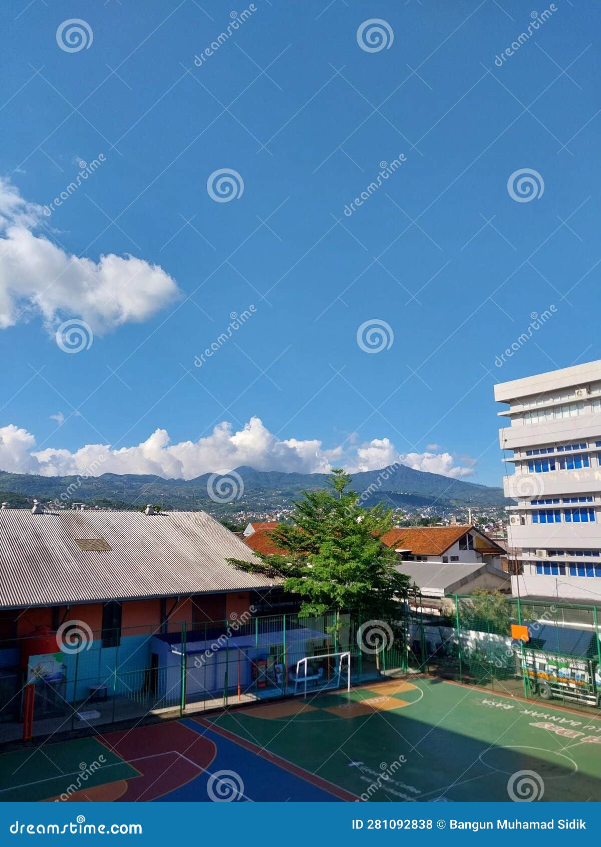 The School Building Surrounded by Beautiful Mountains and Sky. Stock ...