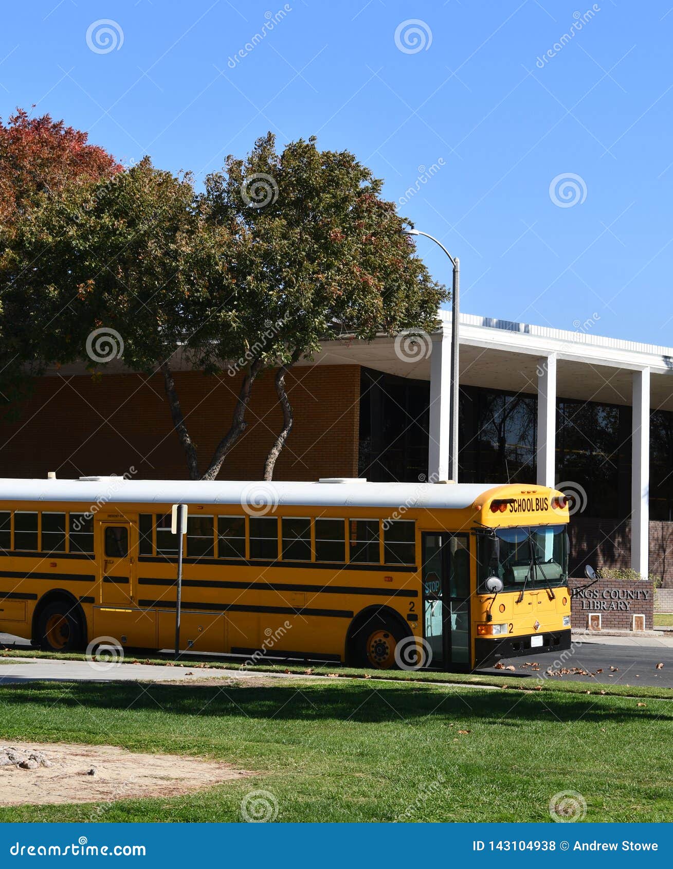 School Bus Parked while the Kids Visit a Local Library Stock Photo ...