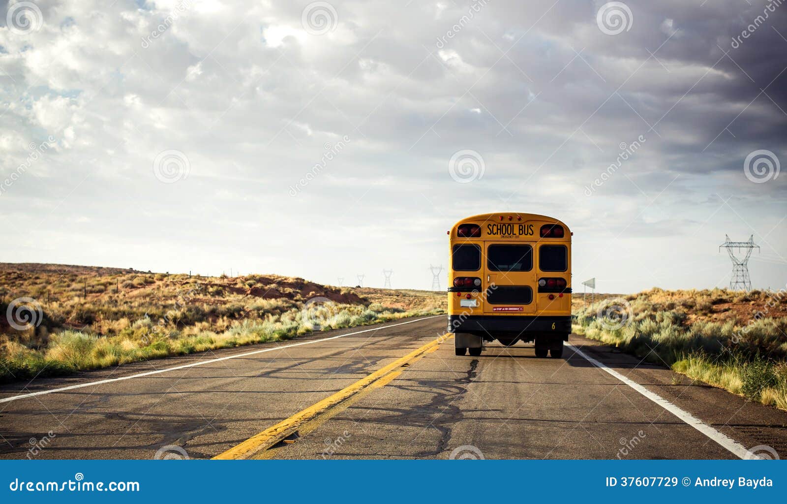 School bus on the road stock image. Image of district - 37607729
