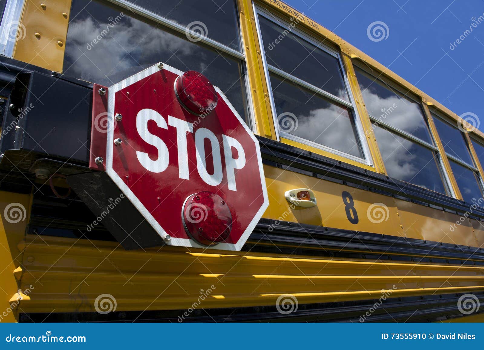 School bus with stop sign stock photo. Image of sign - 73555910