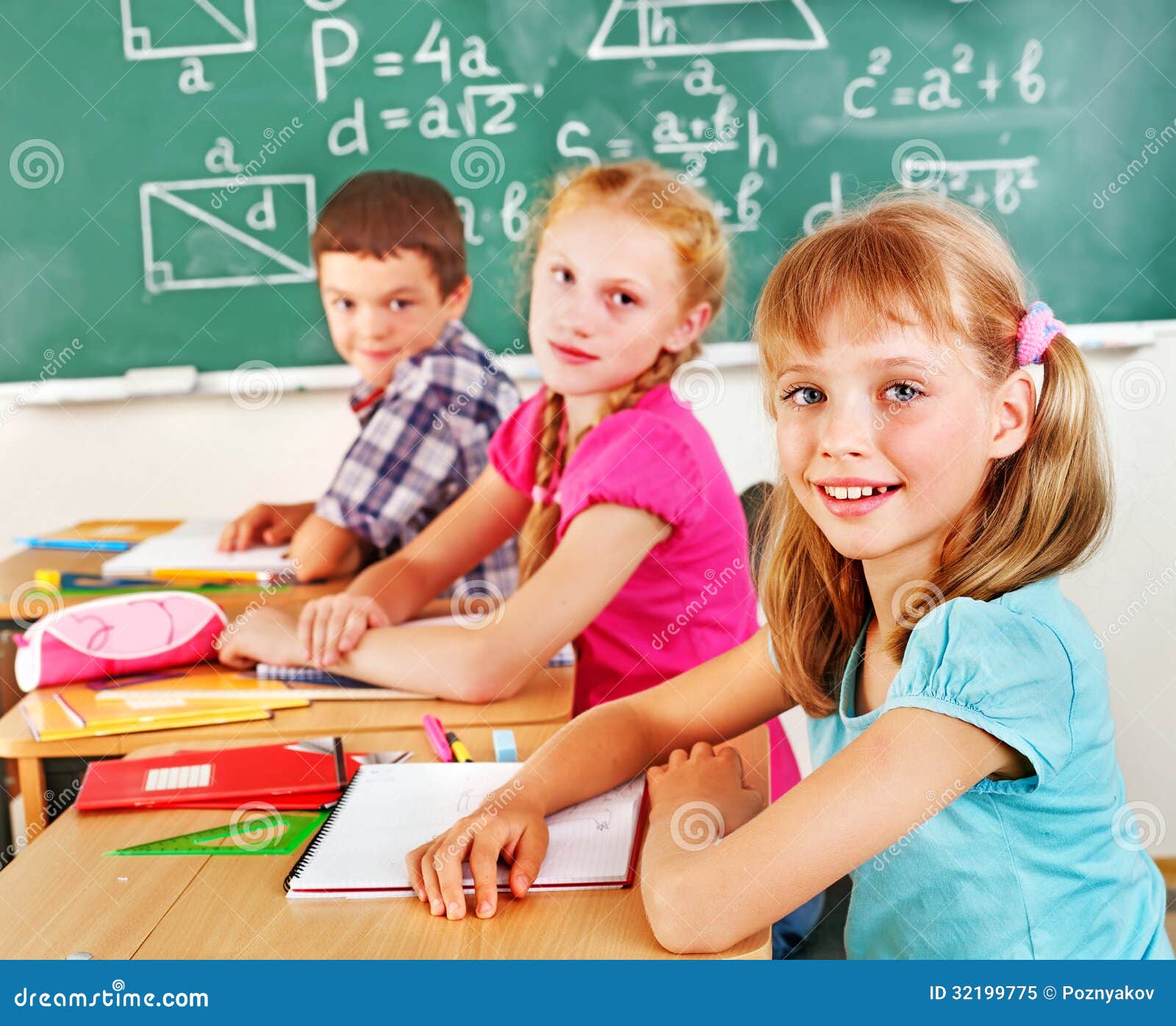 School Child Sitting in Classroom. Stock Image - Image of classmates ...
