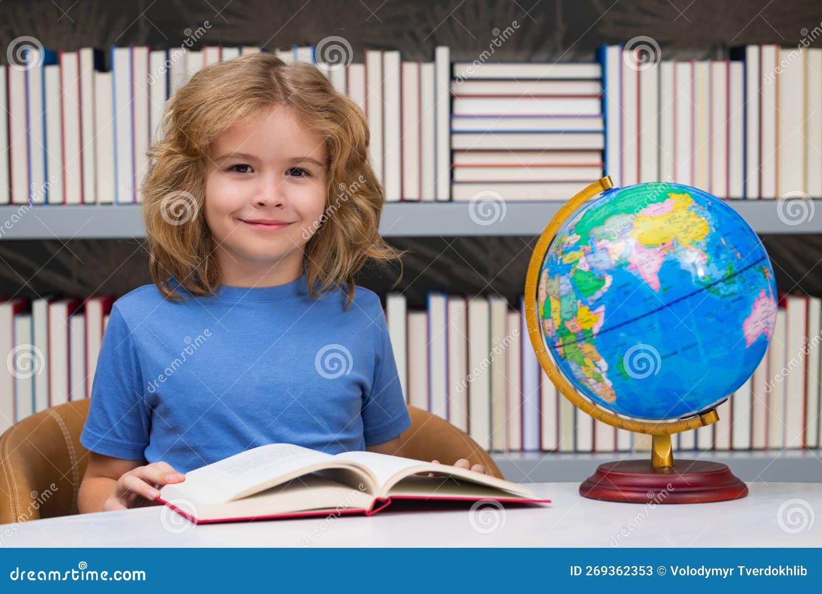 School Child Studying in Classroom at Elementary School. Kid Studying ...