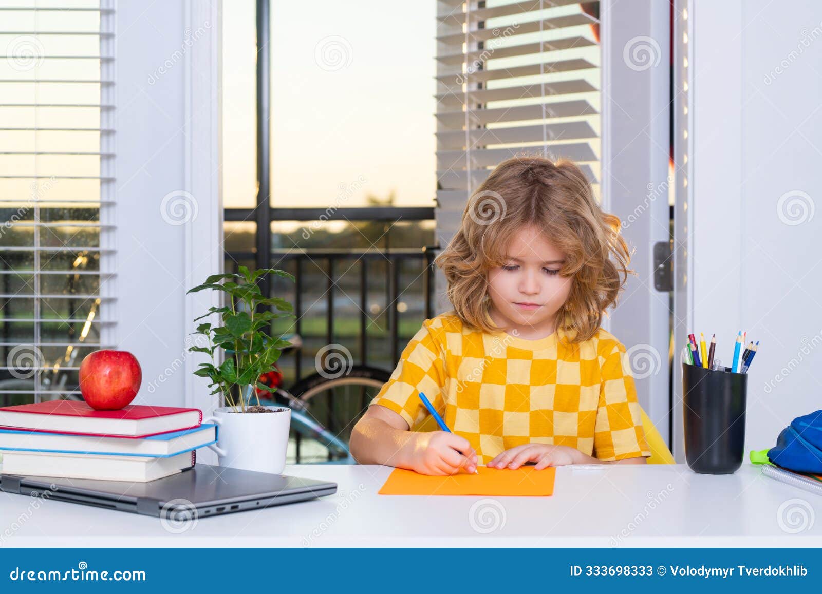 School Child Studying Writing School Homework at Home. Kid from ...