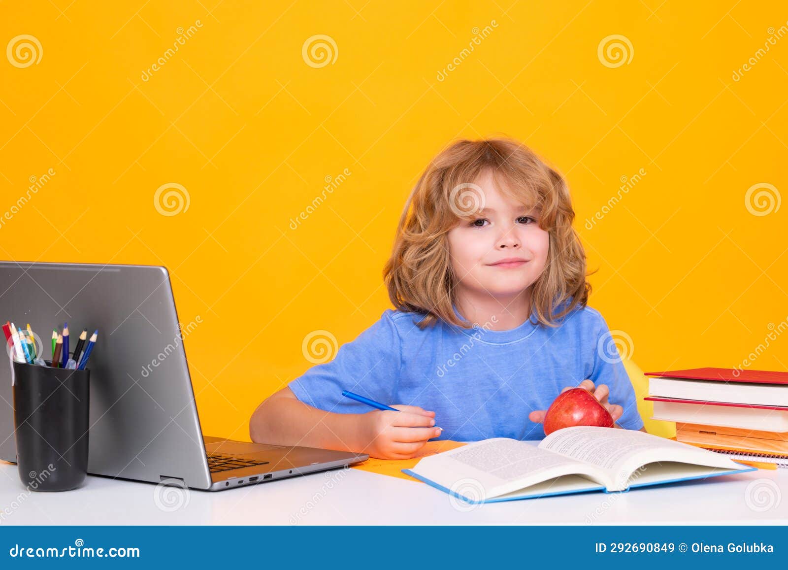 School Child Using Laptop Computer. Nerd School Kid Isolated on Studio ...