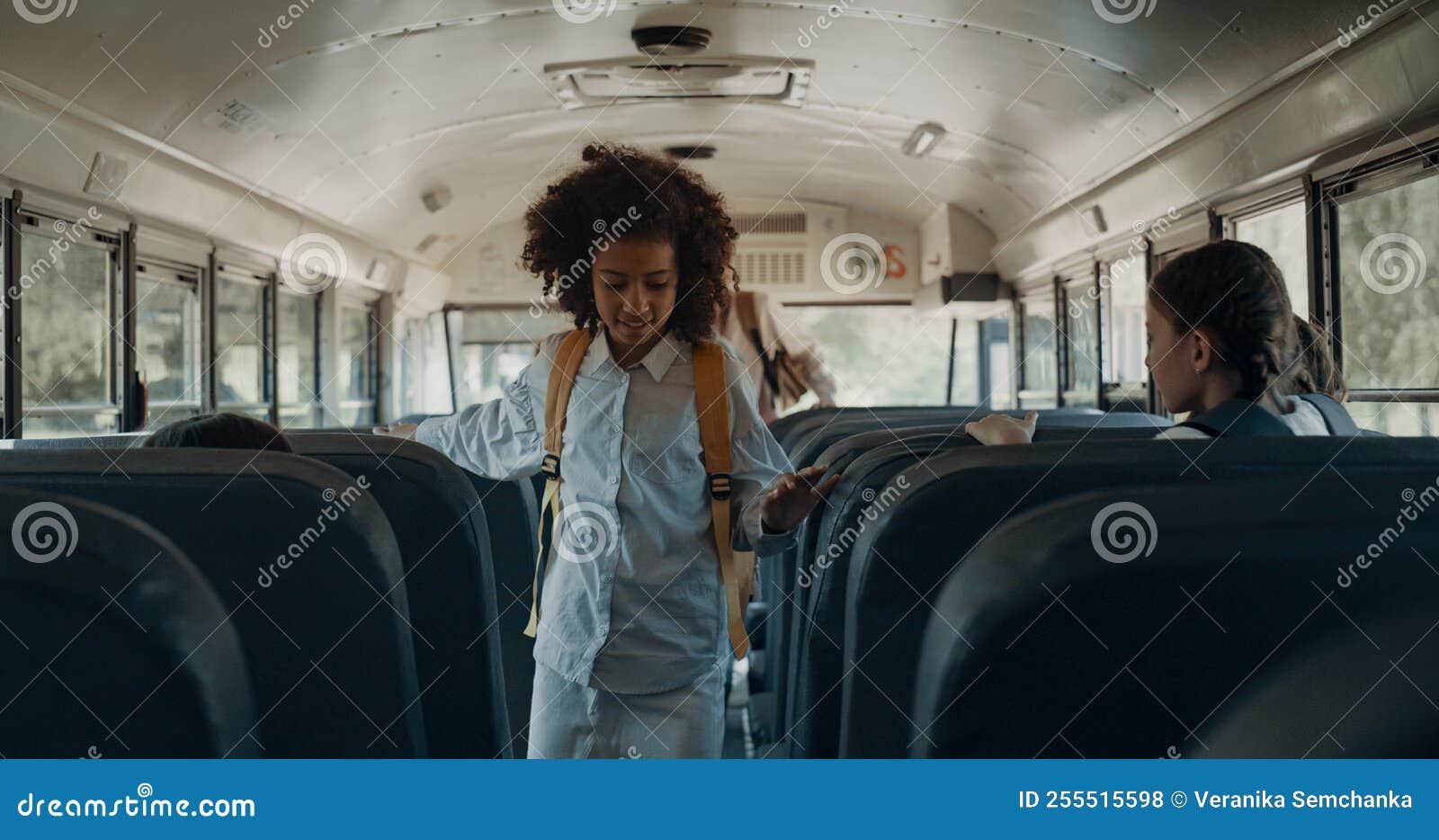 School Children Boarding Schoolbus. Diverse Students Getting in ...