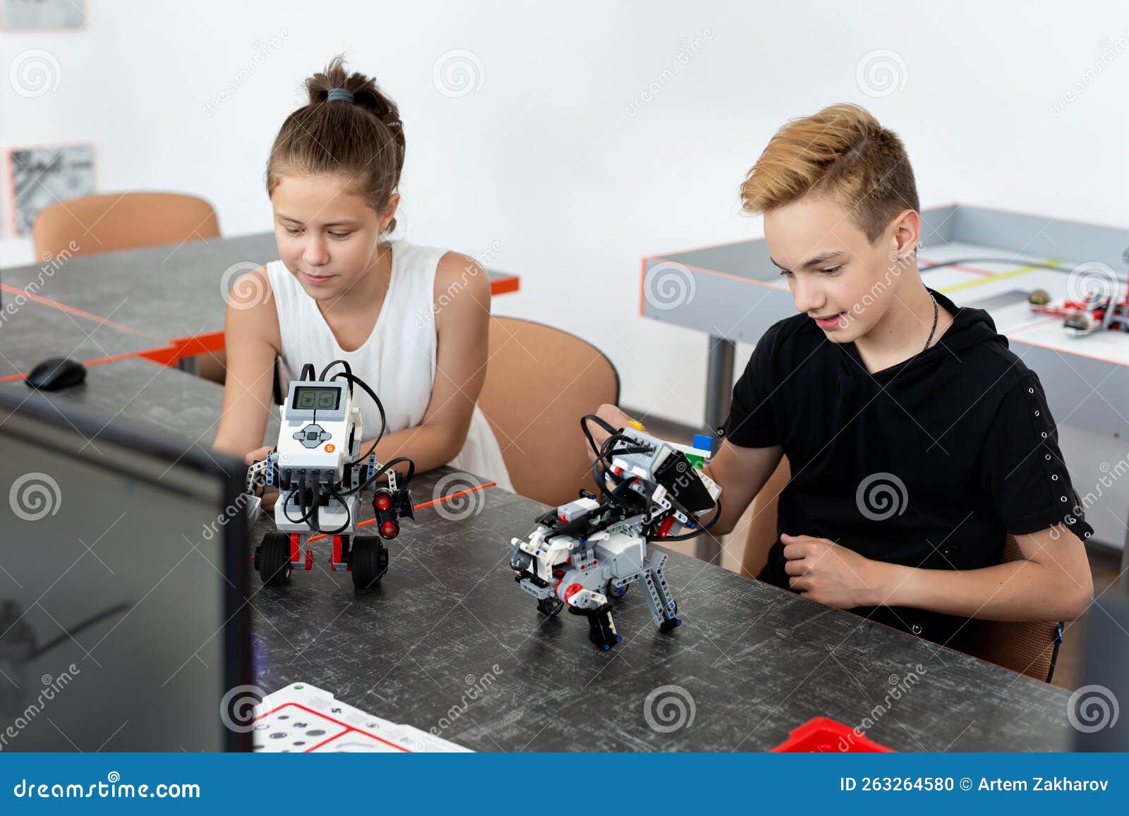 School Children Programs a Robot in the Classroom. Stock Photo - Image ...