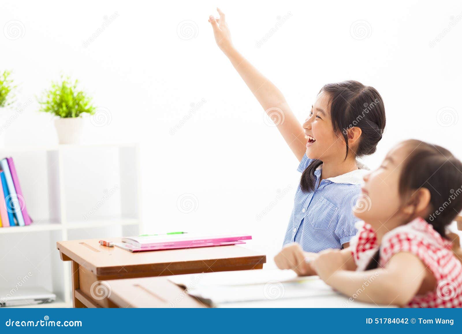School Children Raised Hands in Class Stock Photo - Image of classroom ...