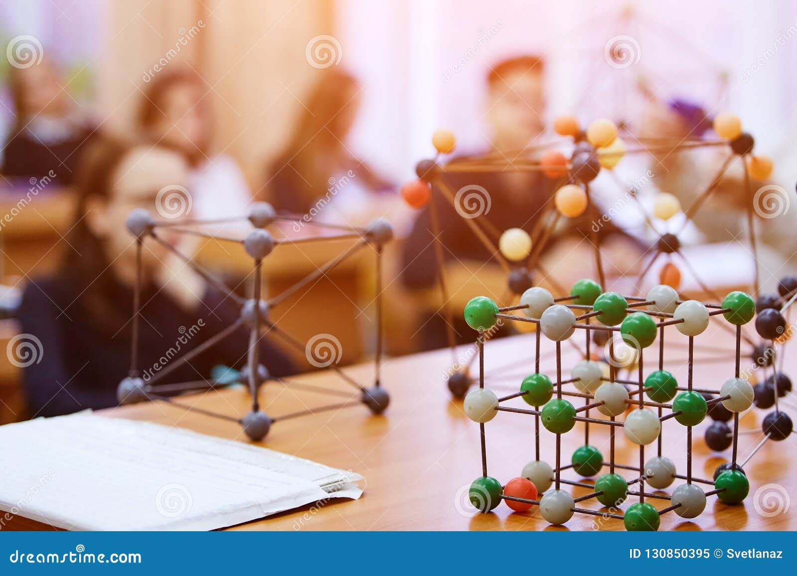 School Children in a Science Class with a Molecular Model. Background ...