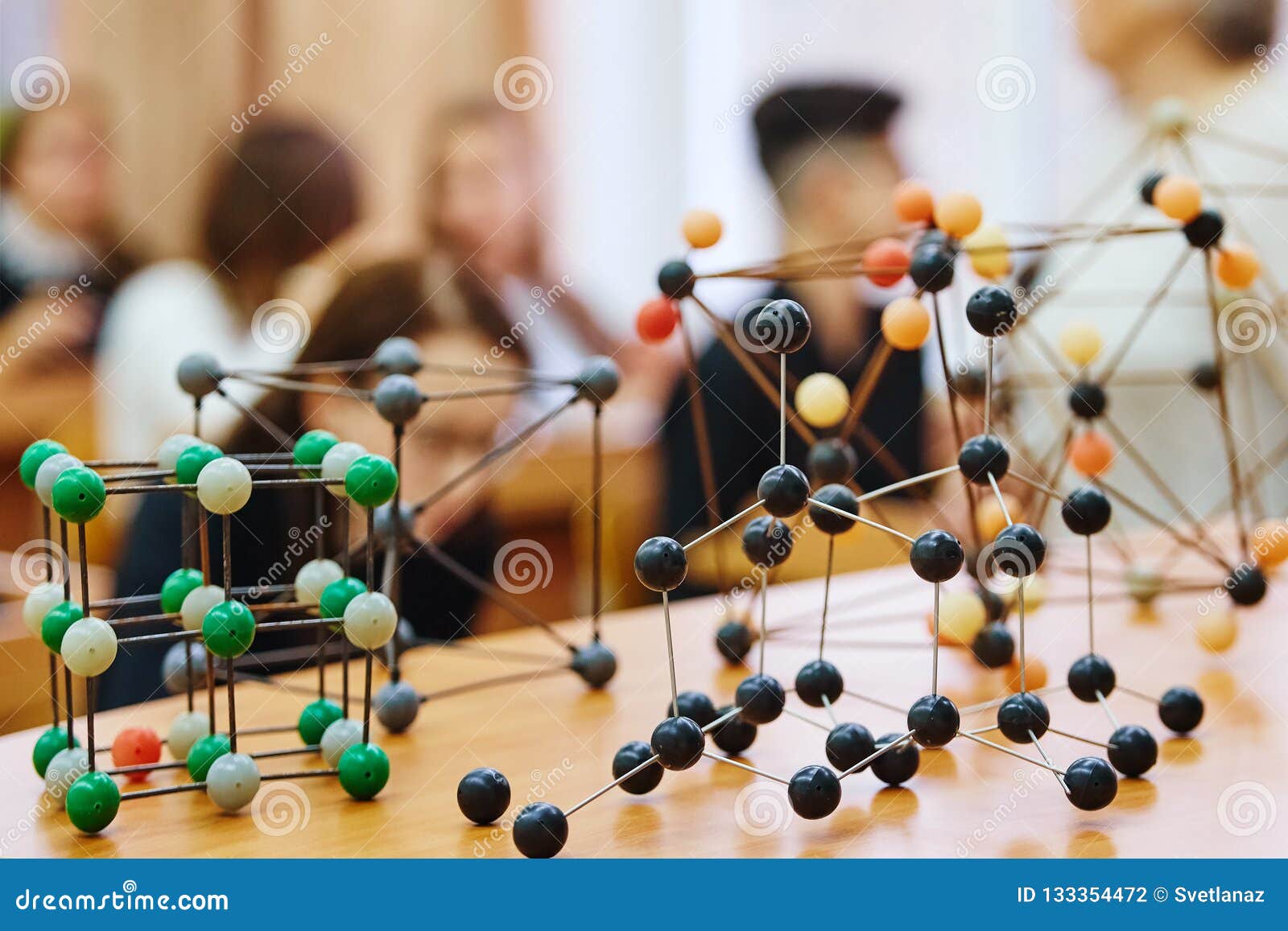 School Children in a Science Class with a Molecular Model. Background ...