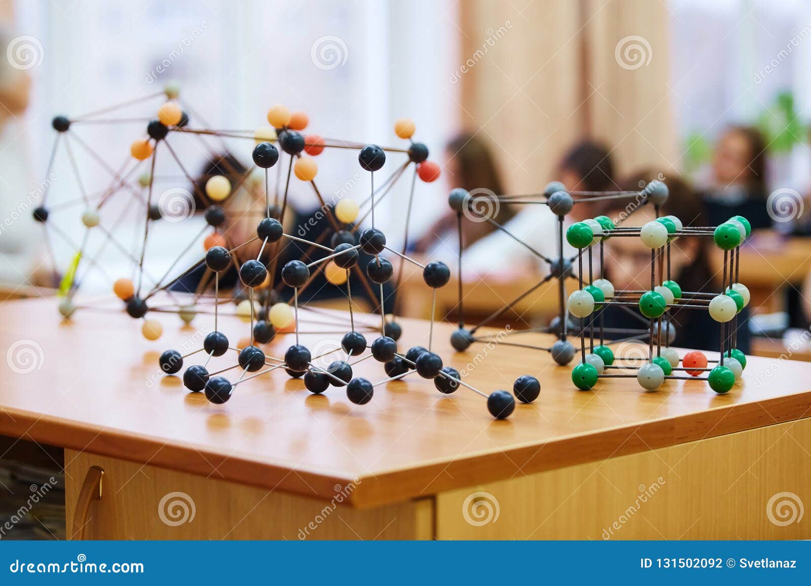 School Children in a Science Class with a Molecular Model. Background ...