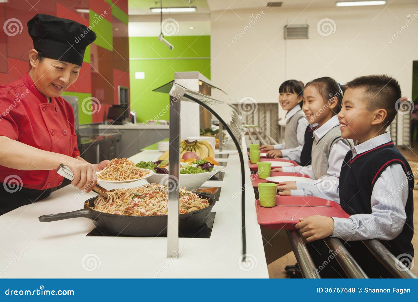 School Children Standing in Line in School Cafeteria Stock Photo ...