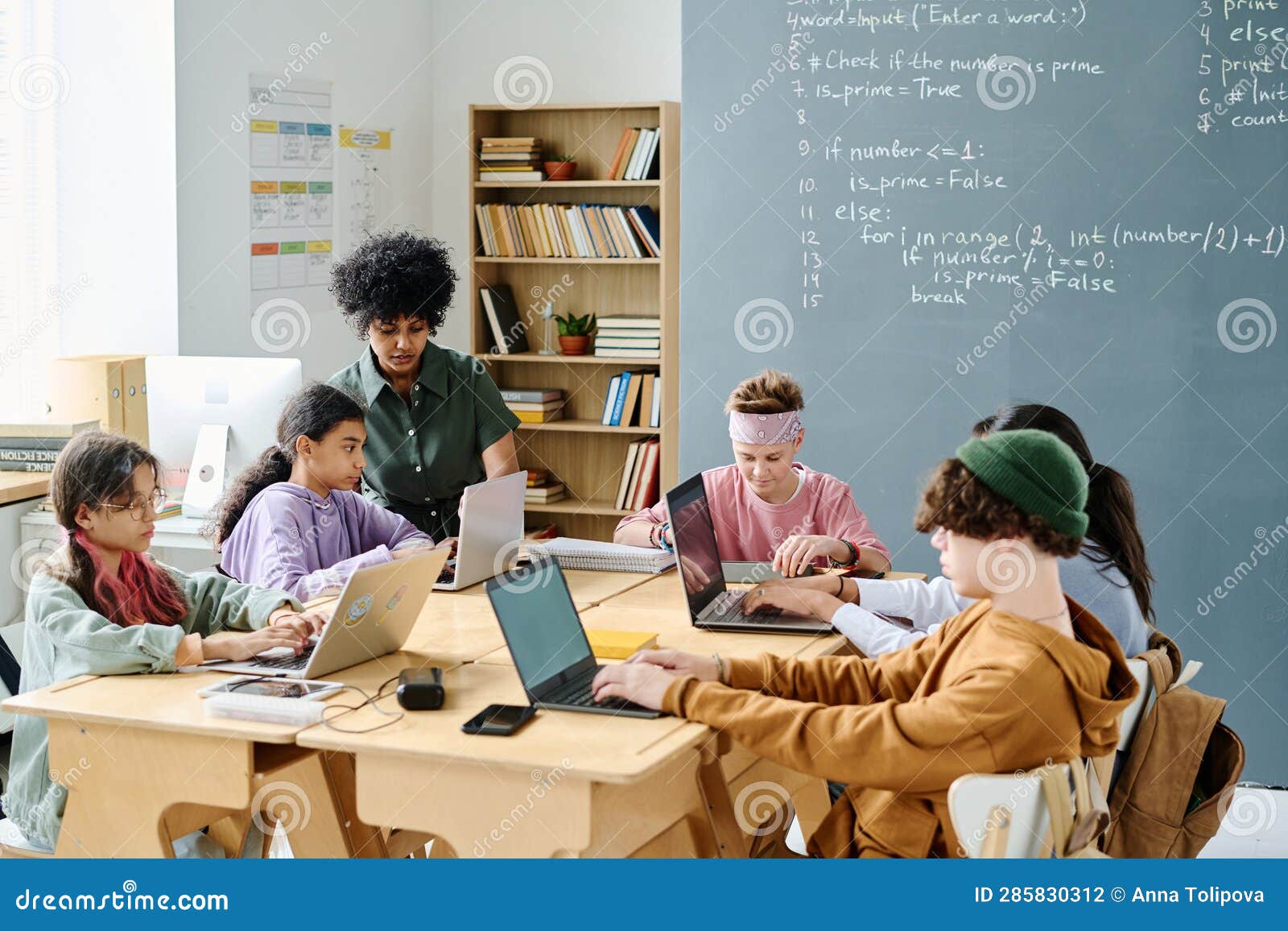 School Children Studying it Together with Teacher Stock Photo - Image ...