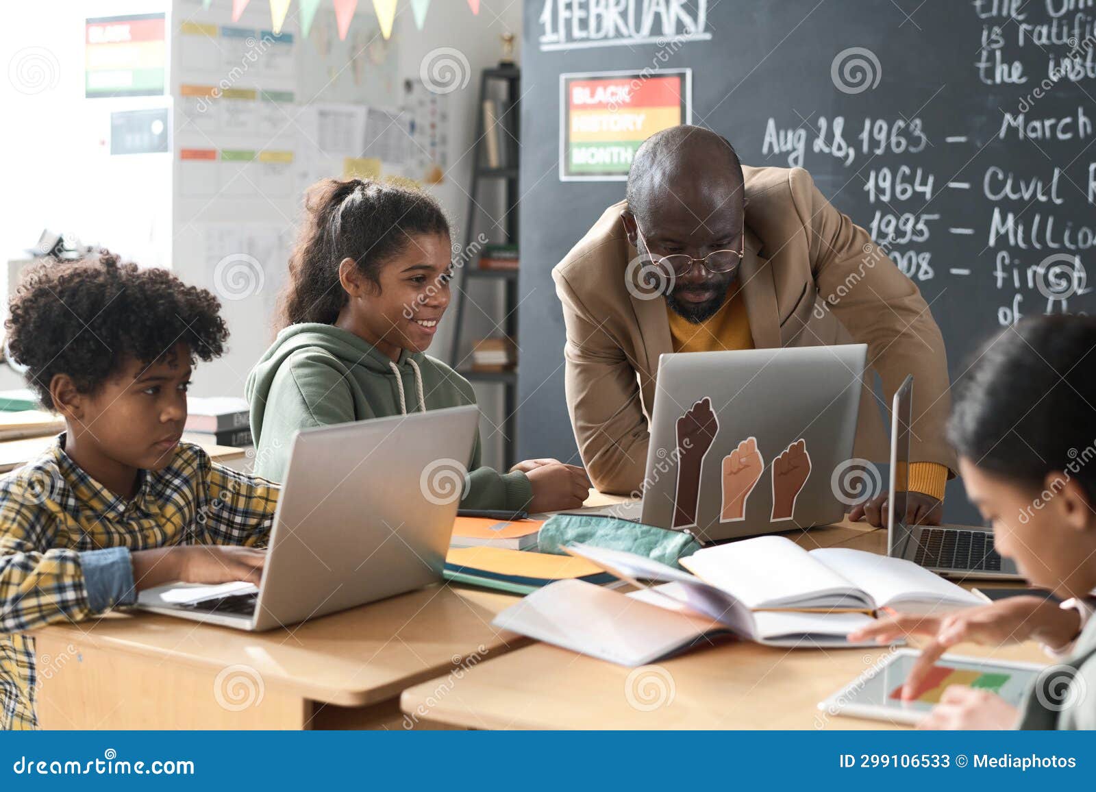School Children Working with Teacher in Team Stock Image - Image of ...