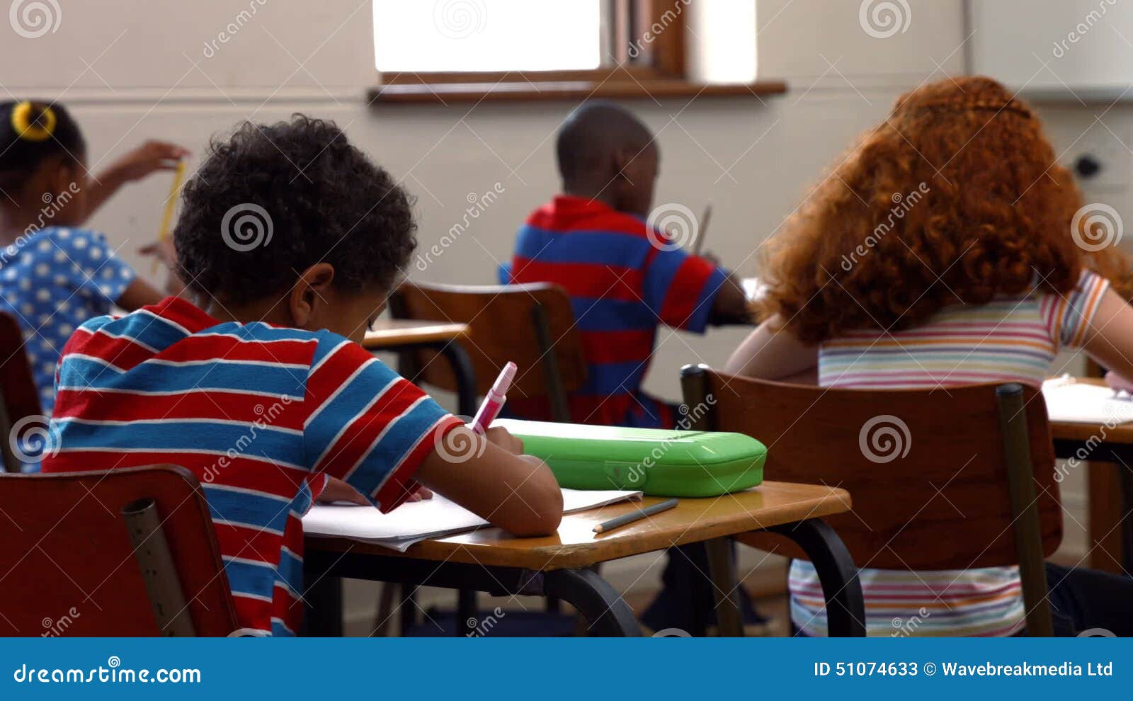 School Children Writing in Classroom Stock Video - Video of development ...