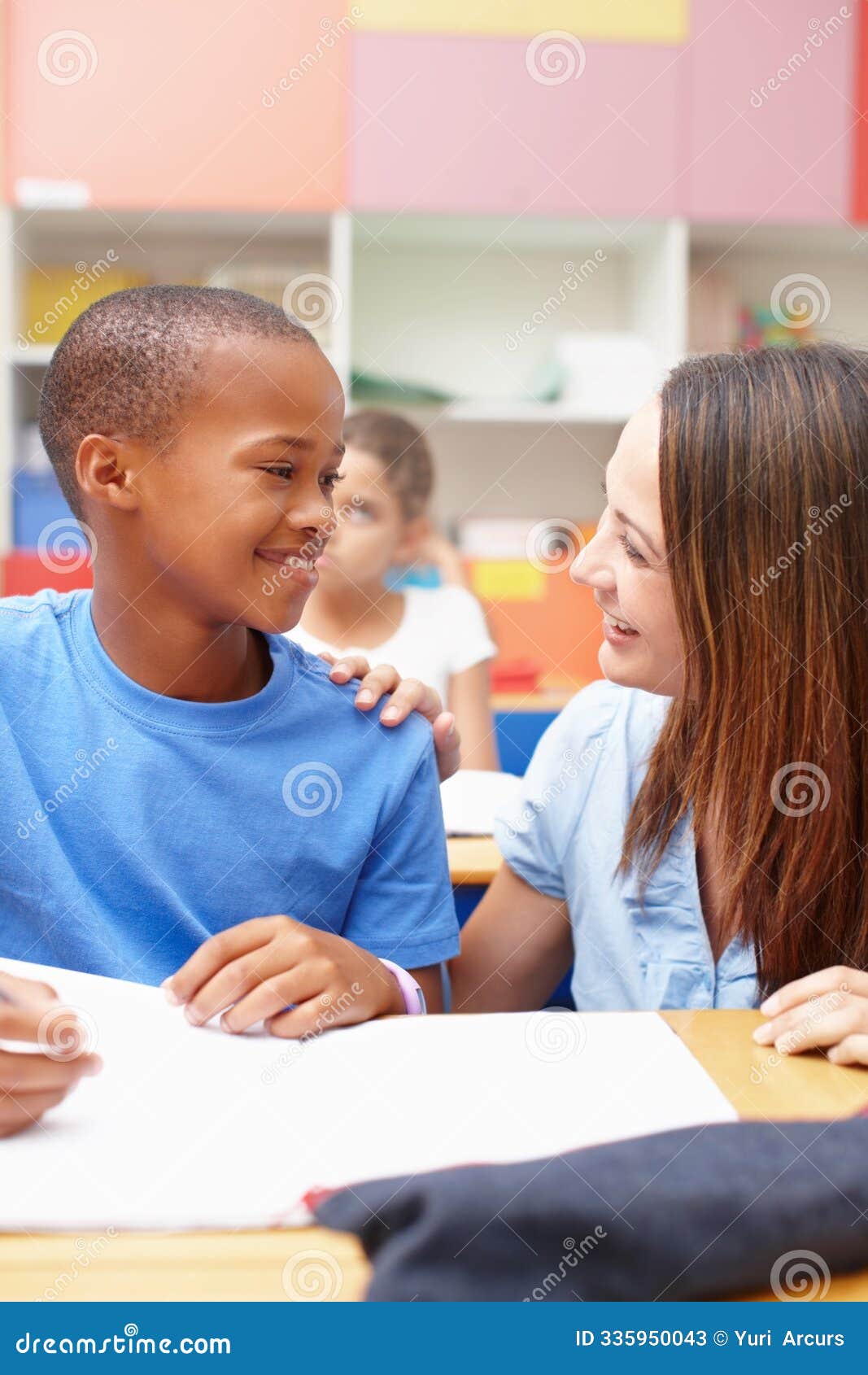 School, Classroom and Teacher with Student for Help with Quiz for ...