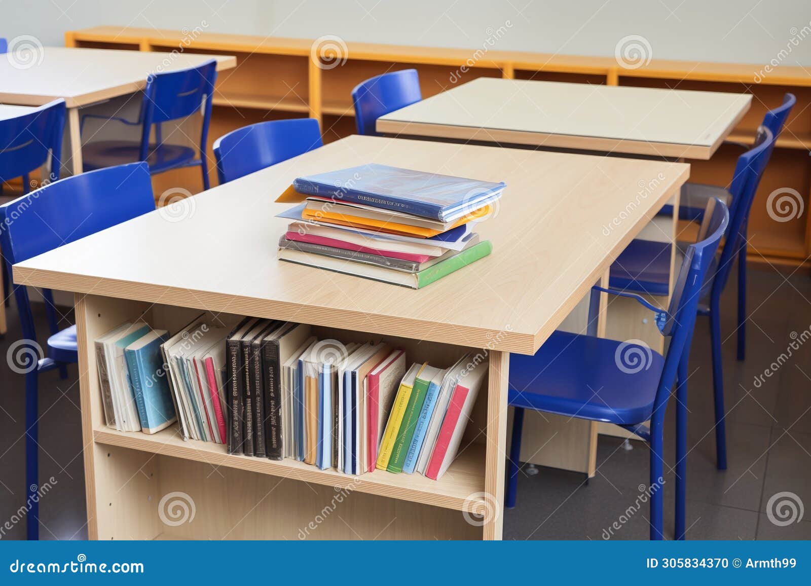School Desk with Books and Chairs in the Classroom. Education Concept ...