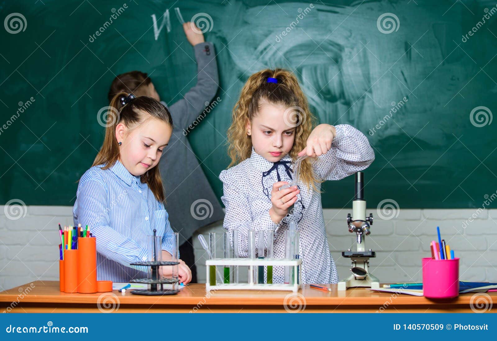School Education. School Girls Study. Kids In Classroom With Microscope ...
