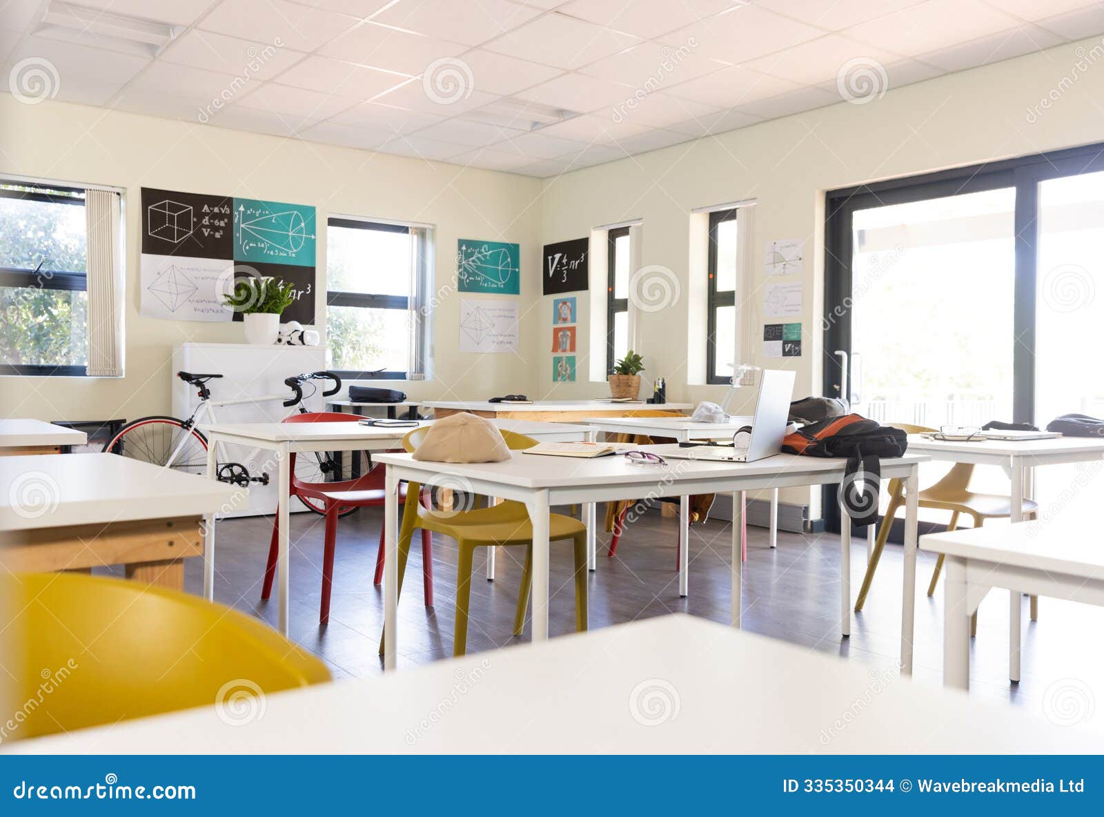At School, Empty Classroom with Desks, Chairs, and Educational Posters ...