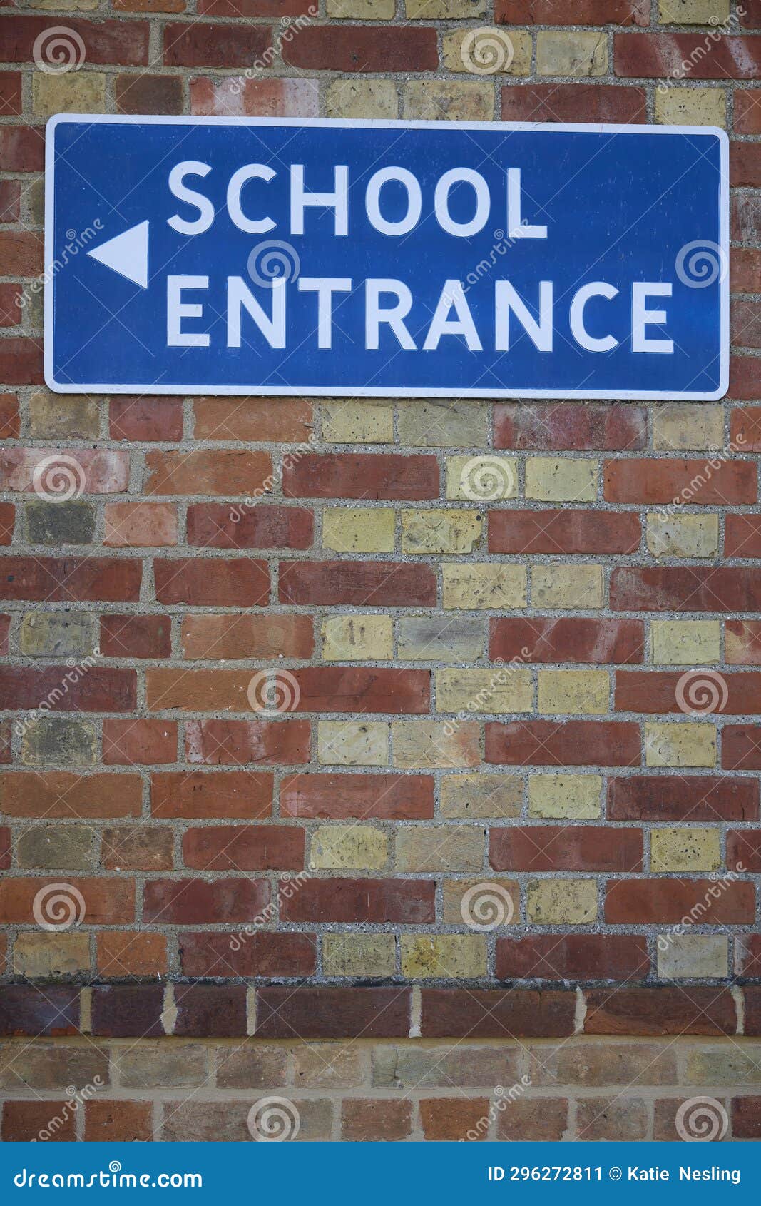 School Entrance Sign on Brick Wall of School Building Stock Image ...