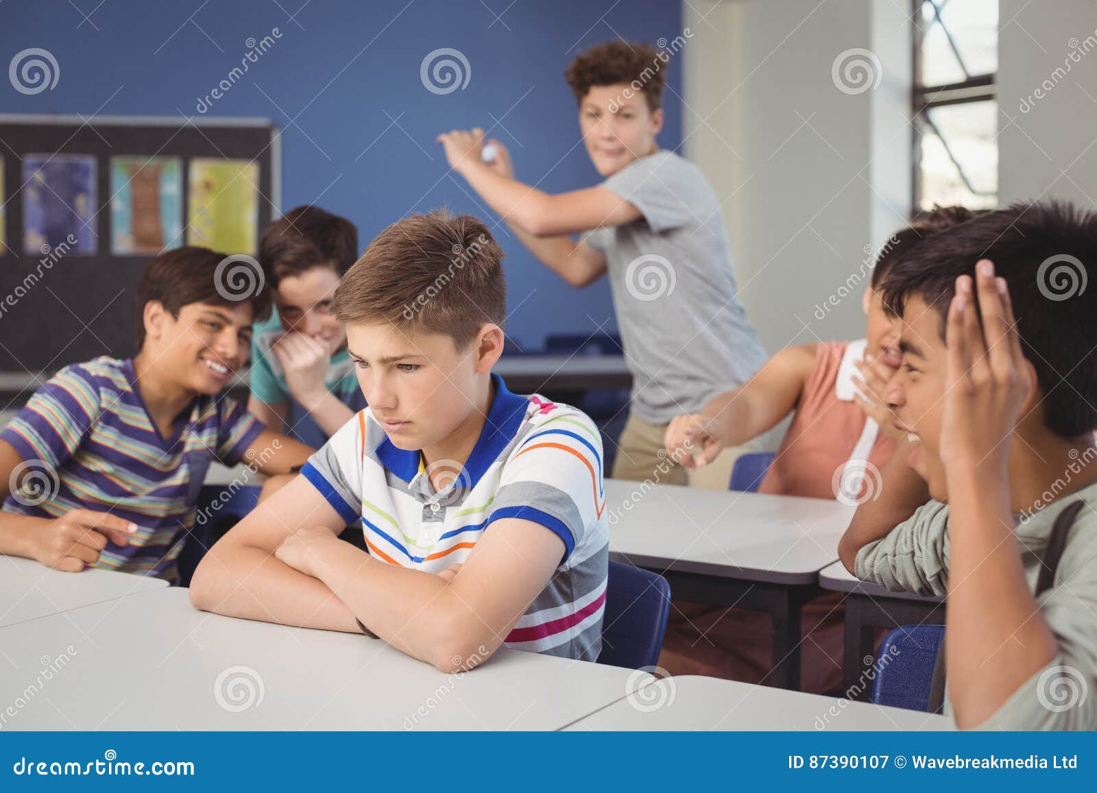 School Friends Bullying a Sad Boy in Classroom Stock Image - Image of ...