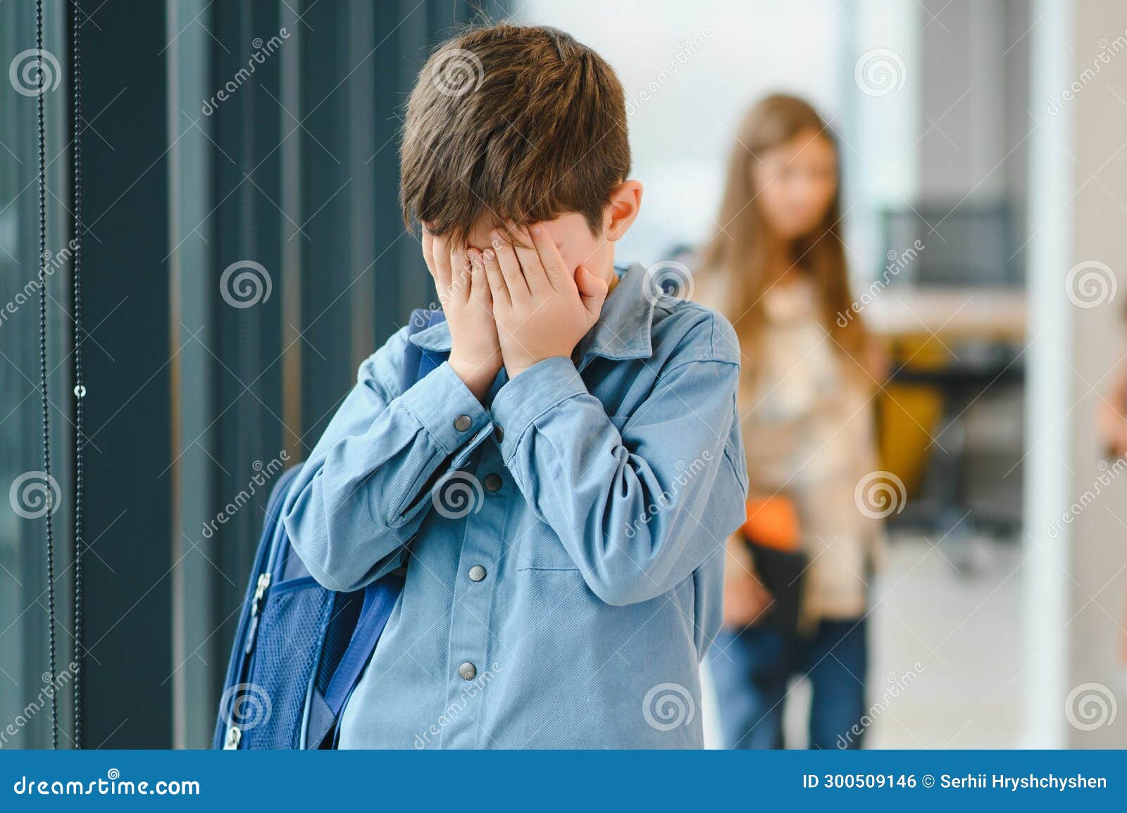 School Friends Bullying a Sad Boy in Corridor at School Stock Photo ...