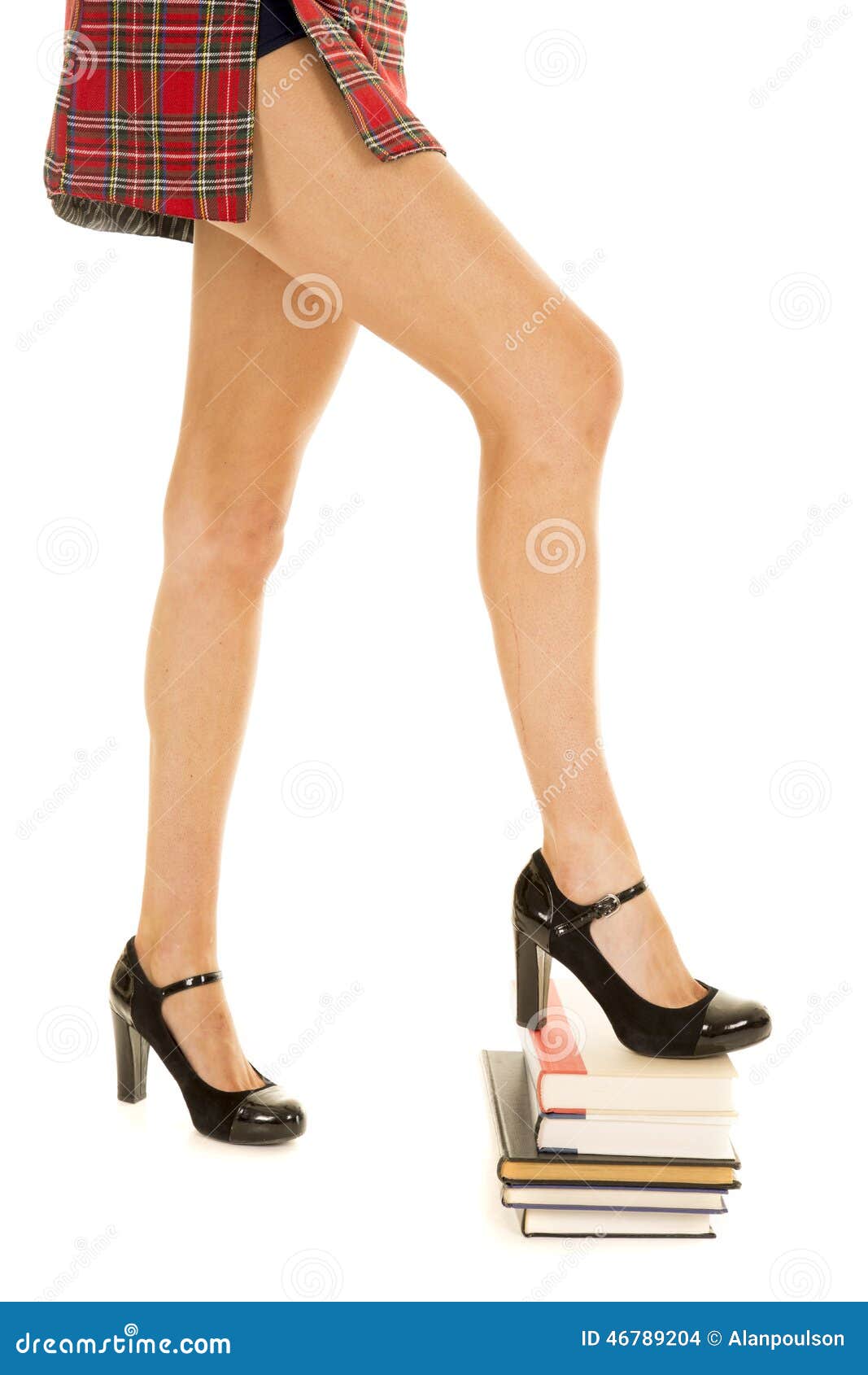 School Girl Legs One Foot on Stack of Books Stock Photo - Image of ...