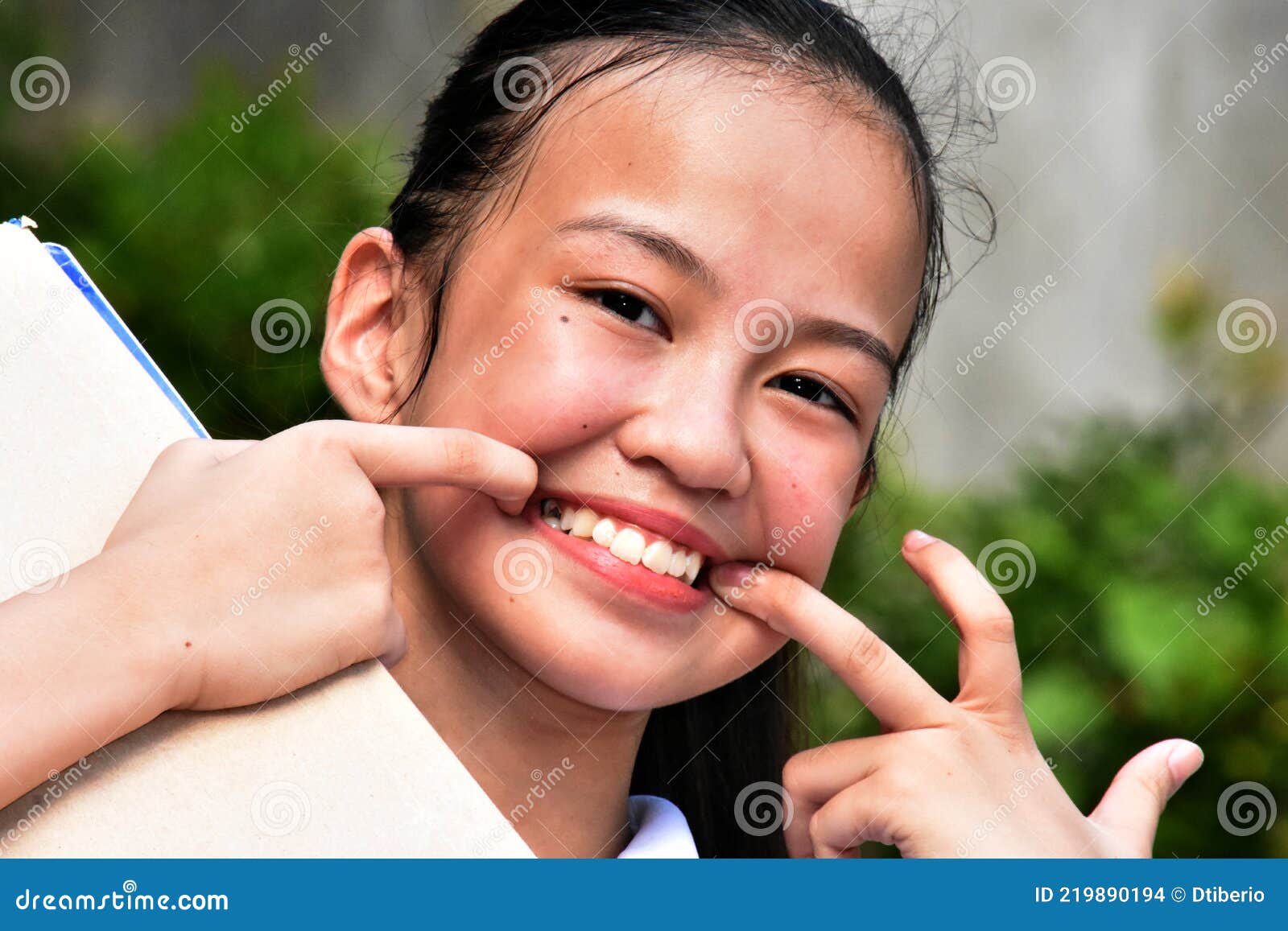 A School Girl Making Funny Faces Stock Photo - Image of funny, academy ...