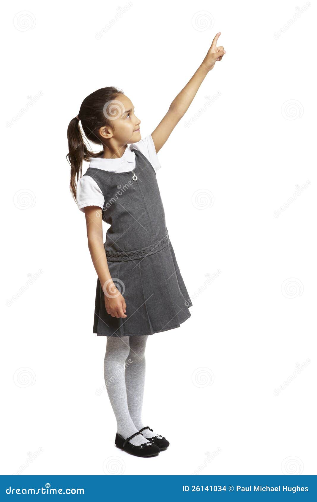 School Girl Pointing Up Smiling Stock Photo - Image of girls, mixed ...