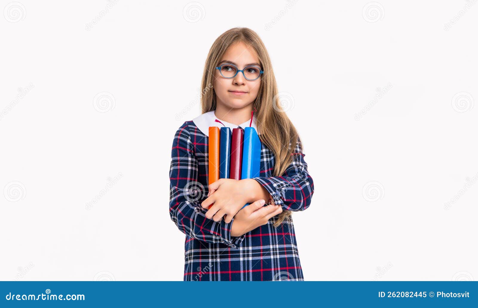 School Girl Reader Holding Stack of Book. Photo of School Girl Reader ...