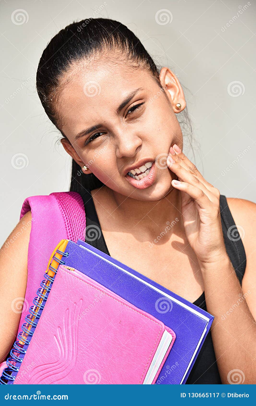 School Girl with Toothache stock image. Image of pretty - 130665117