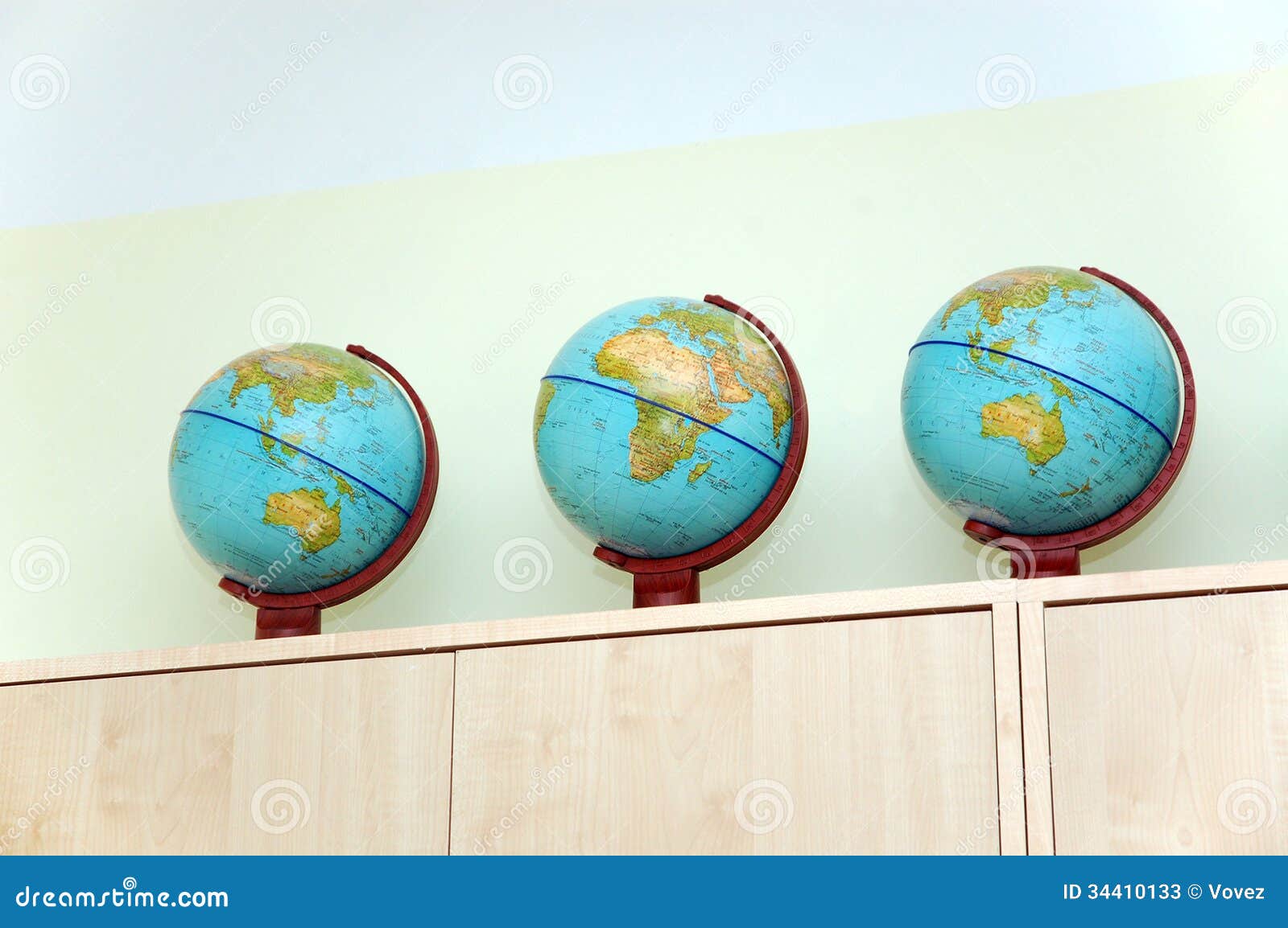 School Globes Of The Planet Earth With A World Map. Back To School ...