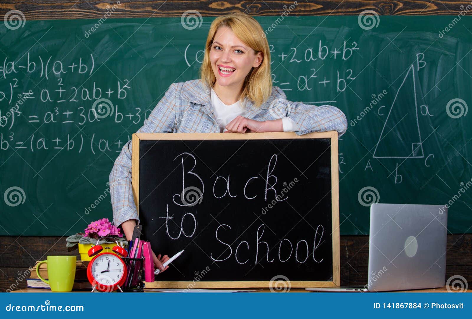 Math Teacher Writing Function, Equation Or Calculation On Blackboard In ... Math Teacher Writing Function, Equation Or Calculation On Blackboard In ...