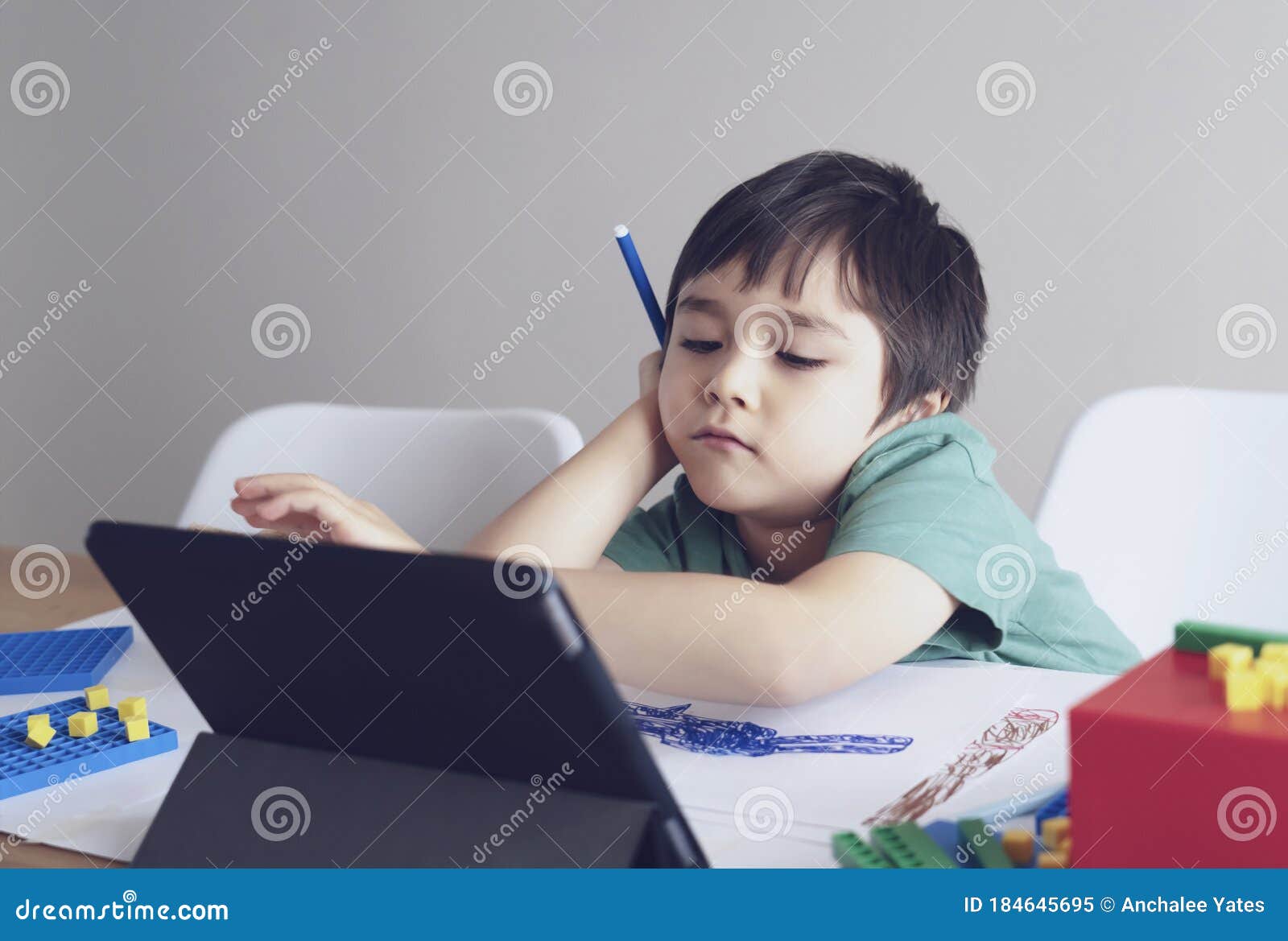 School Kid in Self Isolation Using Tablet for Homework,Child Sad Face ...