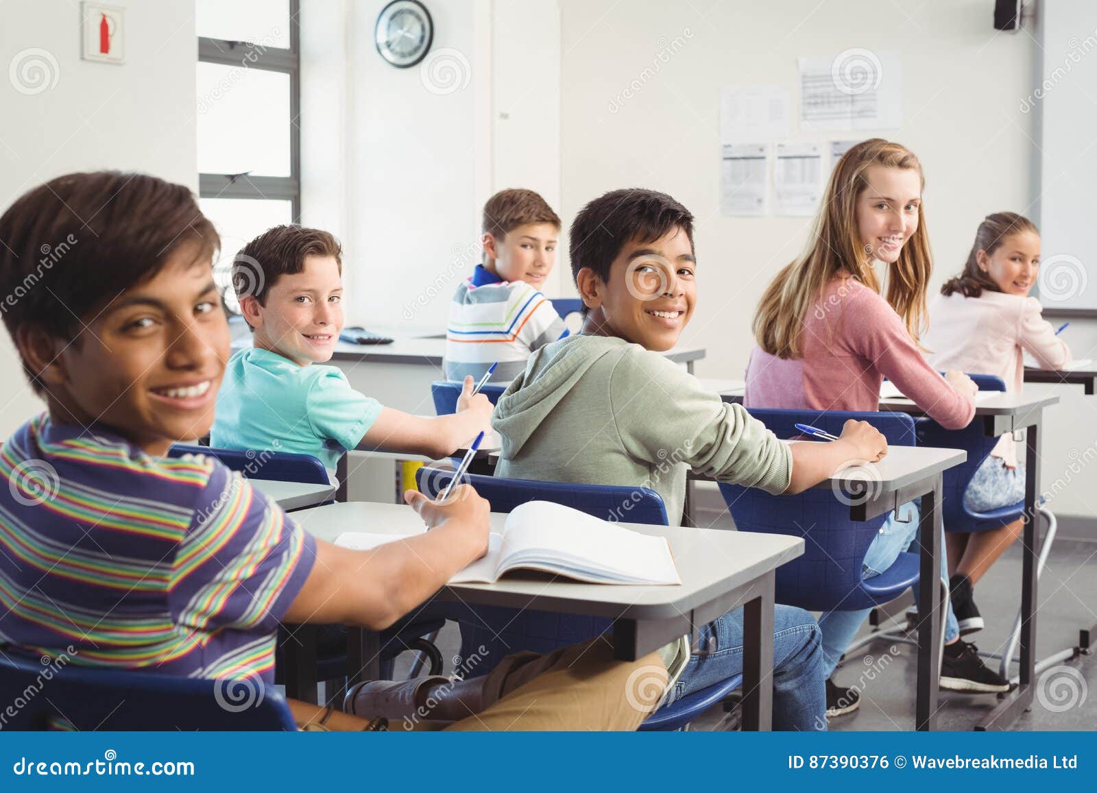 School Kids Doing Homework in Classroom at School Stock Photo - Image ...