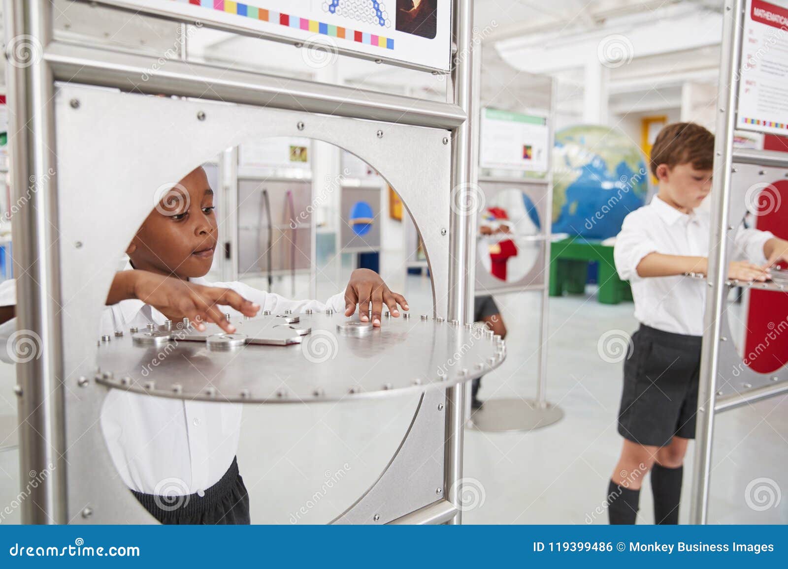 School Kids Doing Science Tests at a Science Centre Stock Photo - Image ...