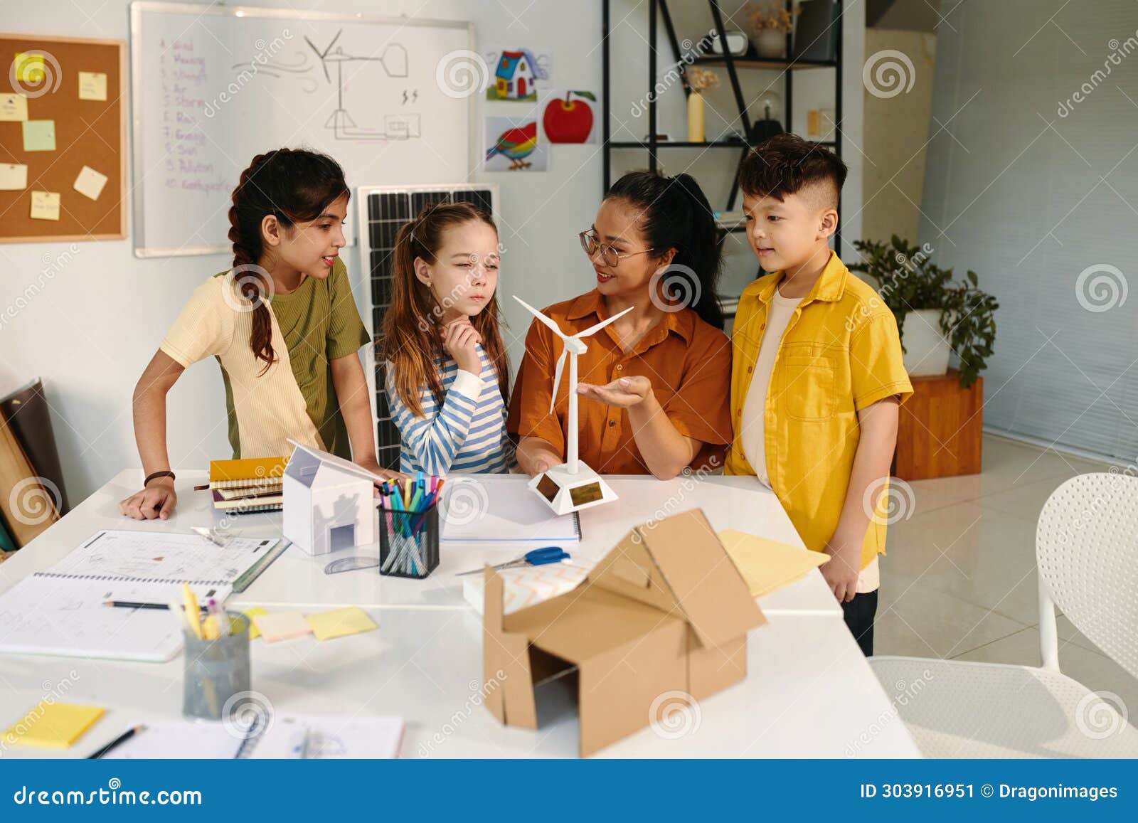 School Kids Looking at Small Wind Turbine Stock Image - Image of asian ...