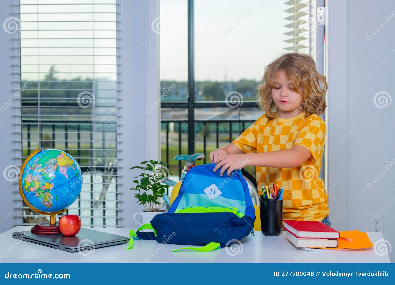 School Kids at Home. Child from Elementary School Puts School Supplies ...