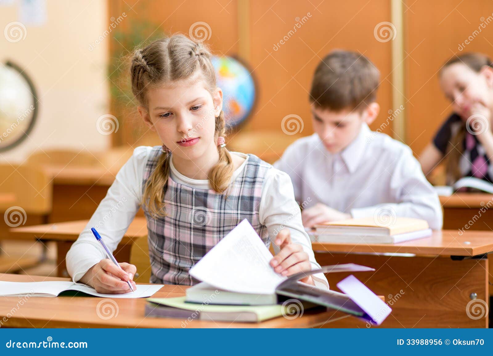 School kids at lesson stock photo. Image of elementary - 33988956